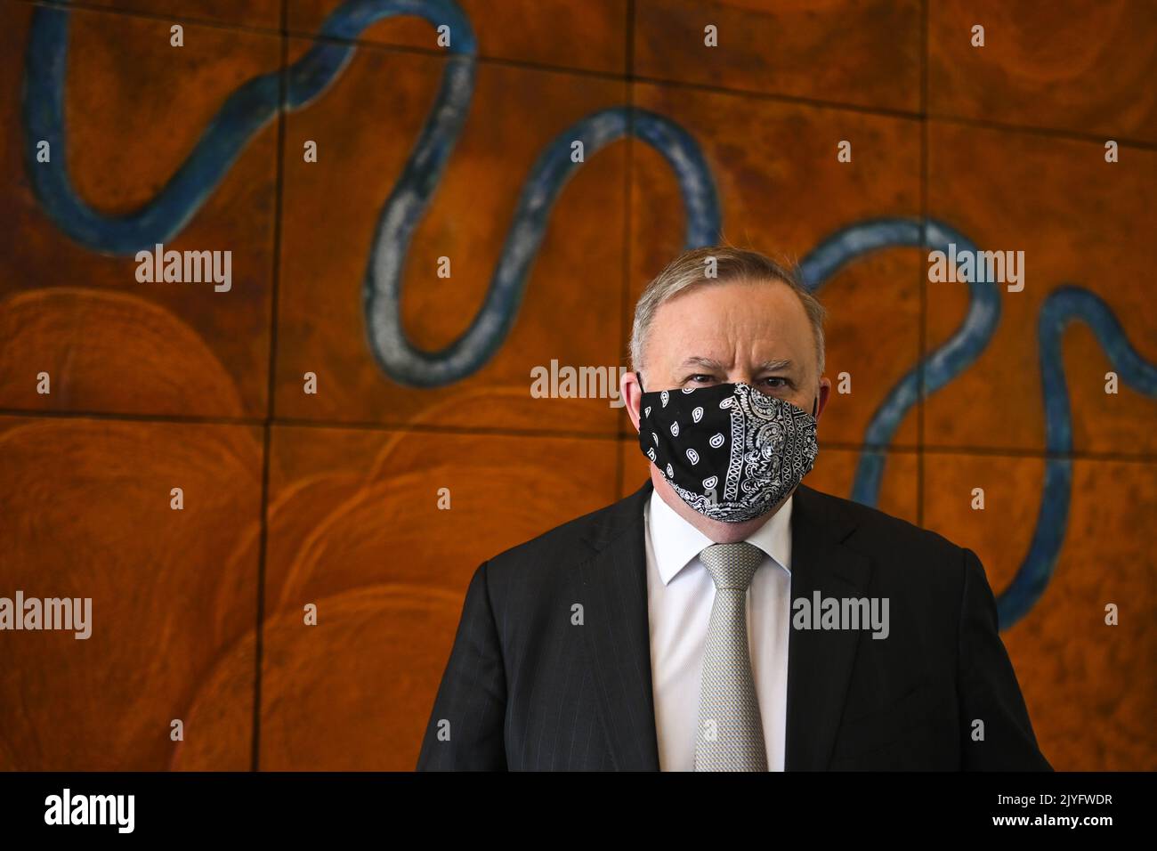 Australian Opposition Leader Anthony Albanese wears a face mask after ...