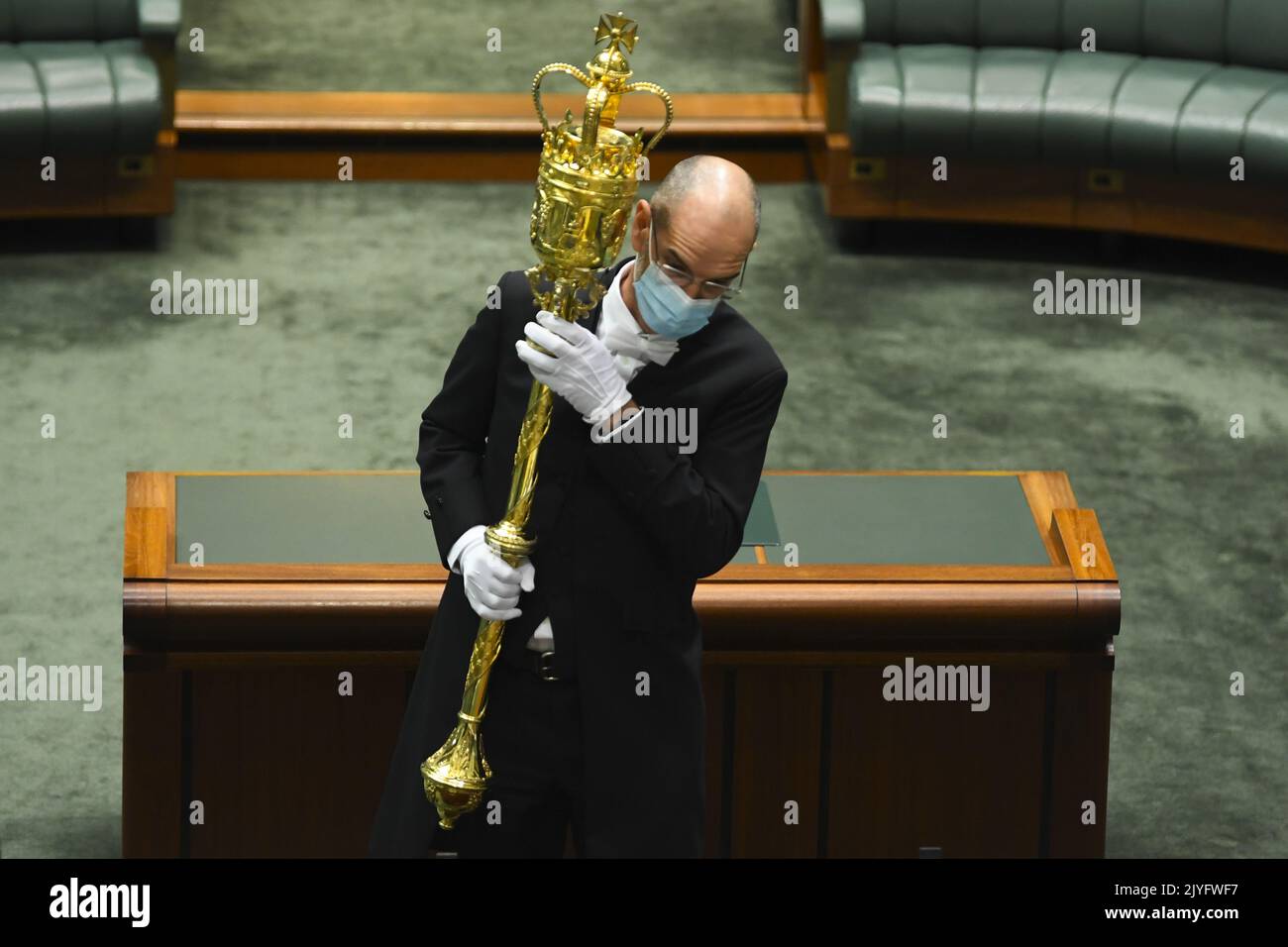 The Serjeant-at-Arms places the mace in position at the beginning of ...