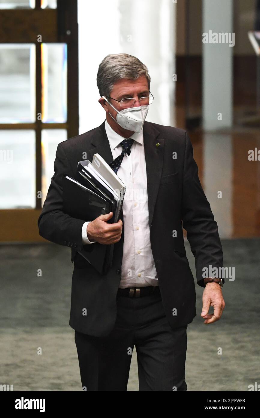 Nationals MP David Gillespie wears a face masks as he enters the House ...