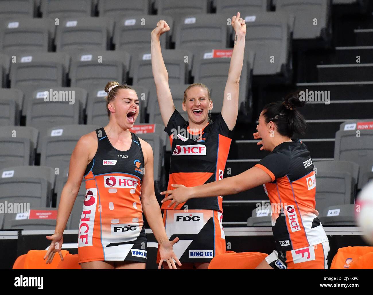 Matilda McDonell (left) and April Brandley (centre) of the Giants ...