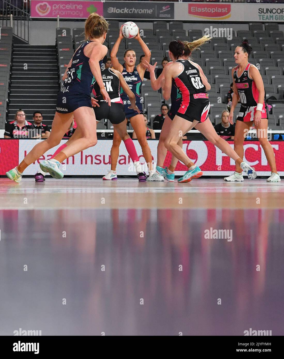 Kate Moloney (centre) of the Vixens in action during the Round 7 Super ...