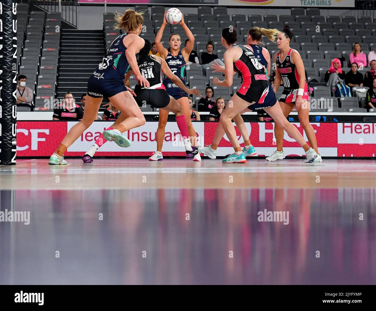 Kate Moloney (centre) of the Vixens in action during the Round 7 Super ...
