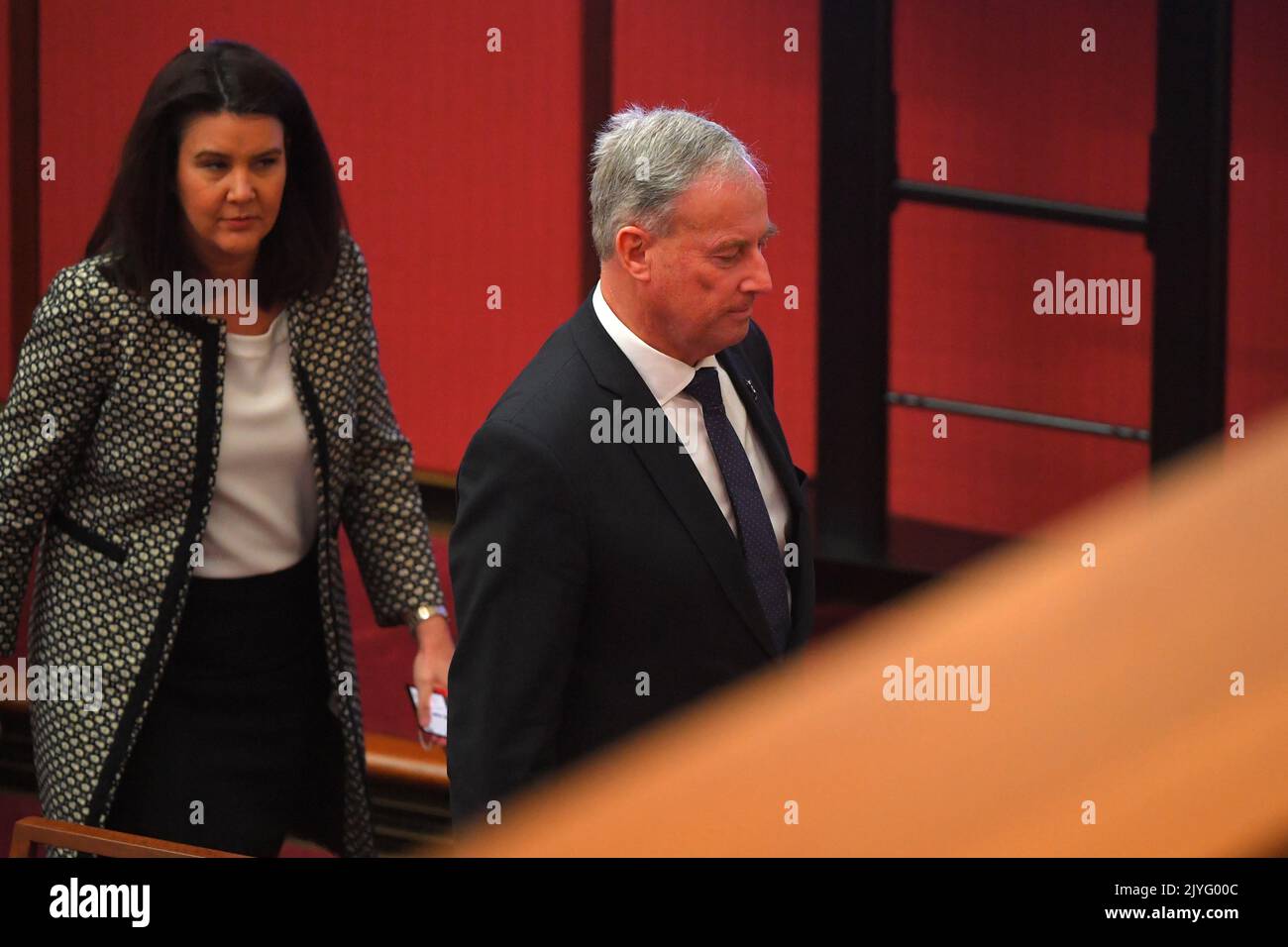 Minister for Aged Care Richard Colbeck leaves after making a statement ...
