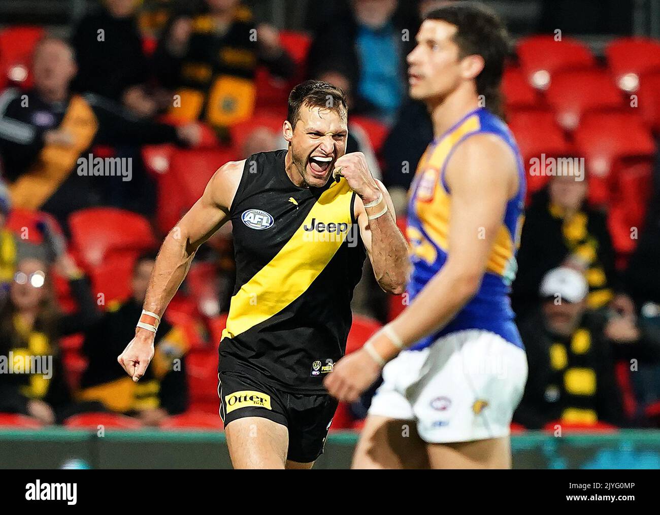 Toby Nankervis of the Tigers reacts after kicking a goal during the ...