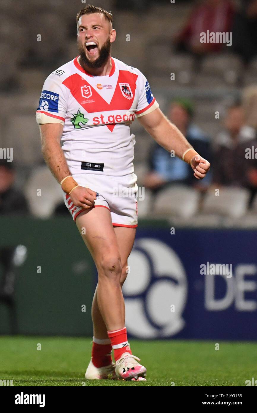 Jacob Host of the Dragons celebrates his try during the round 16 NRL ...