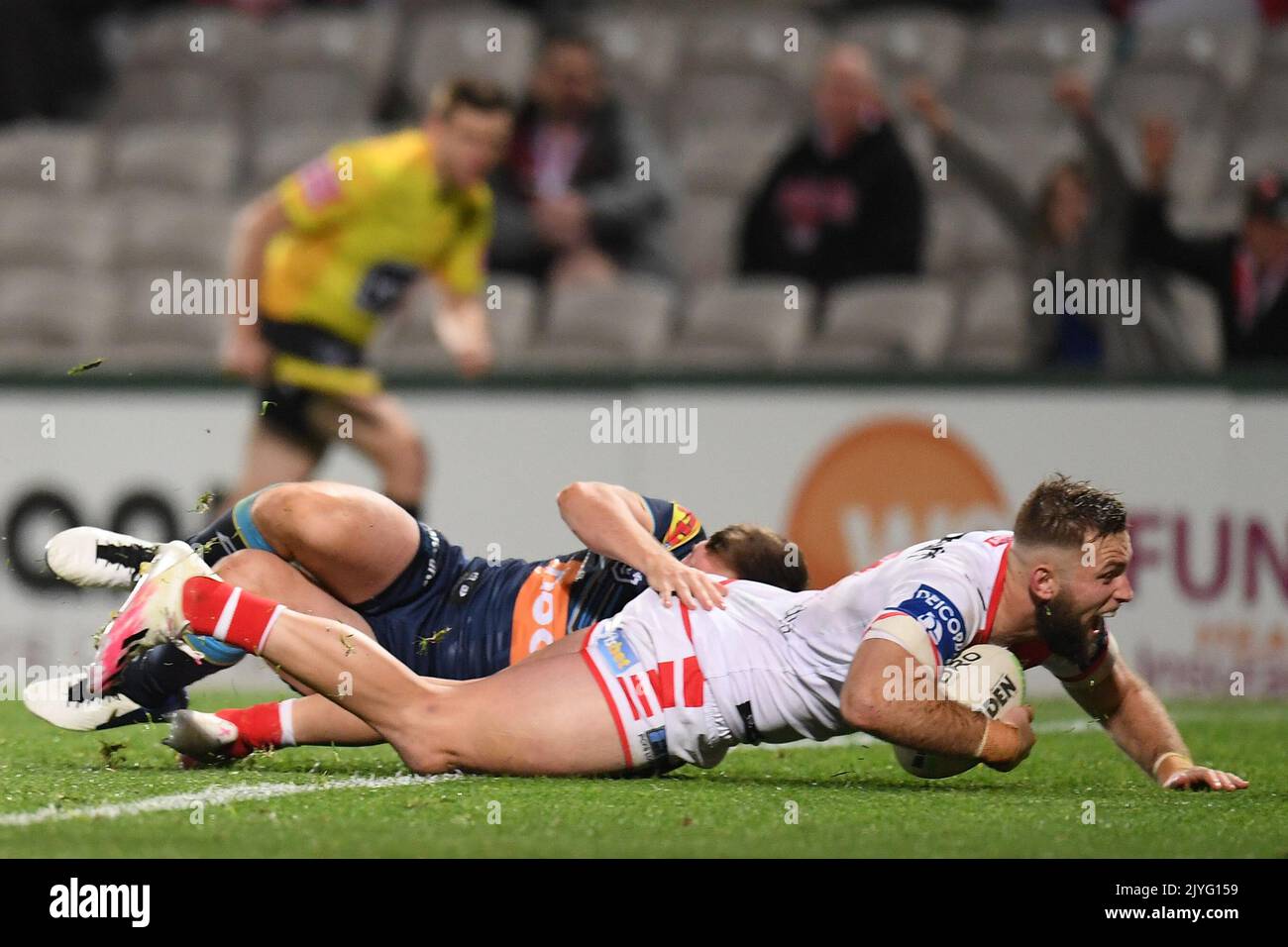 Jacob Host of the Dragons scores a try during the round 16 NRL match ...