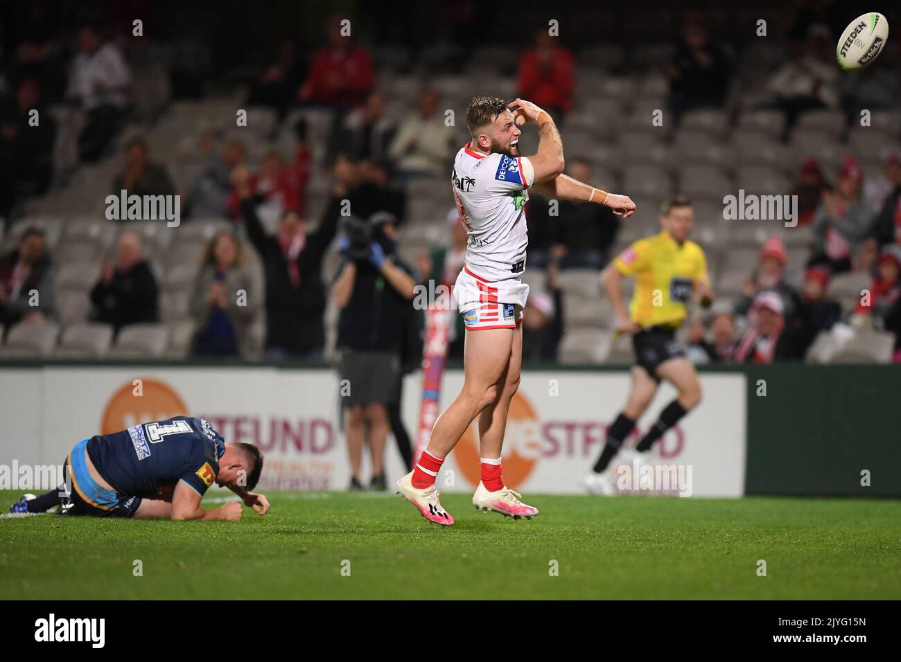 Jacob Host of the Dragons celebrates his try during the round 16 NRL ...