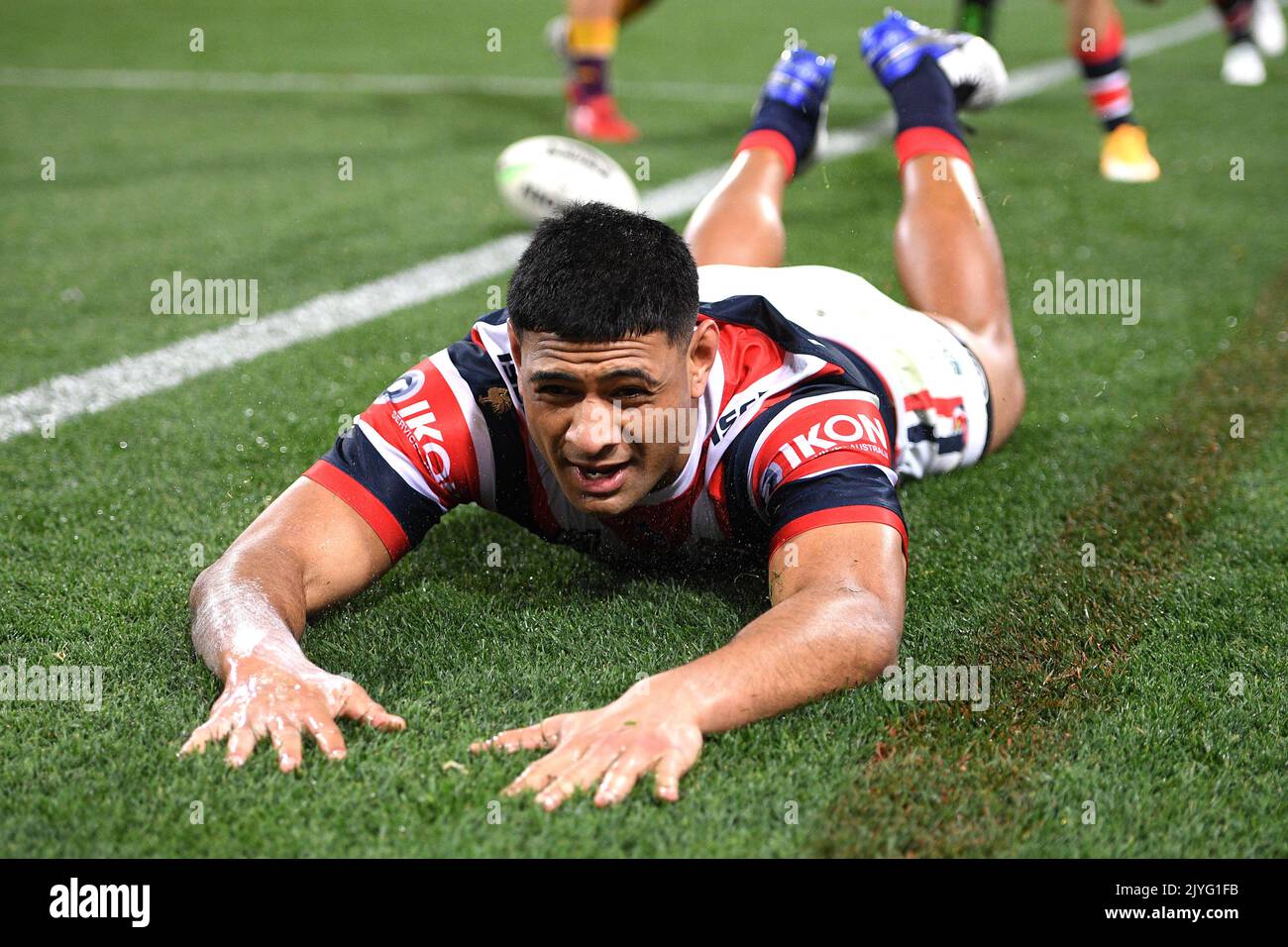 Daniel Tupou of the Roosters scores a try during the round 16 NRL match ...