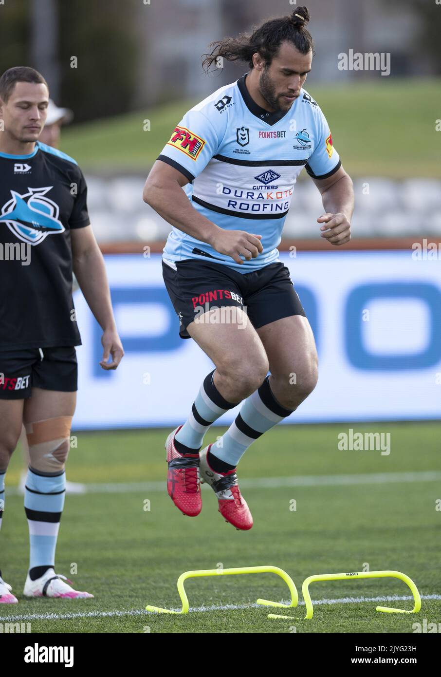Toby Rudolf of the Sharks warms up before the Round 16 NRL match ...