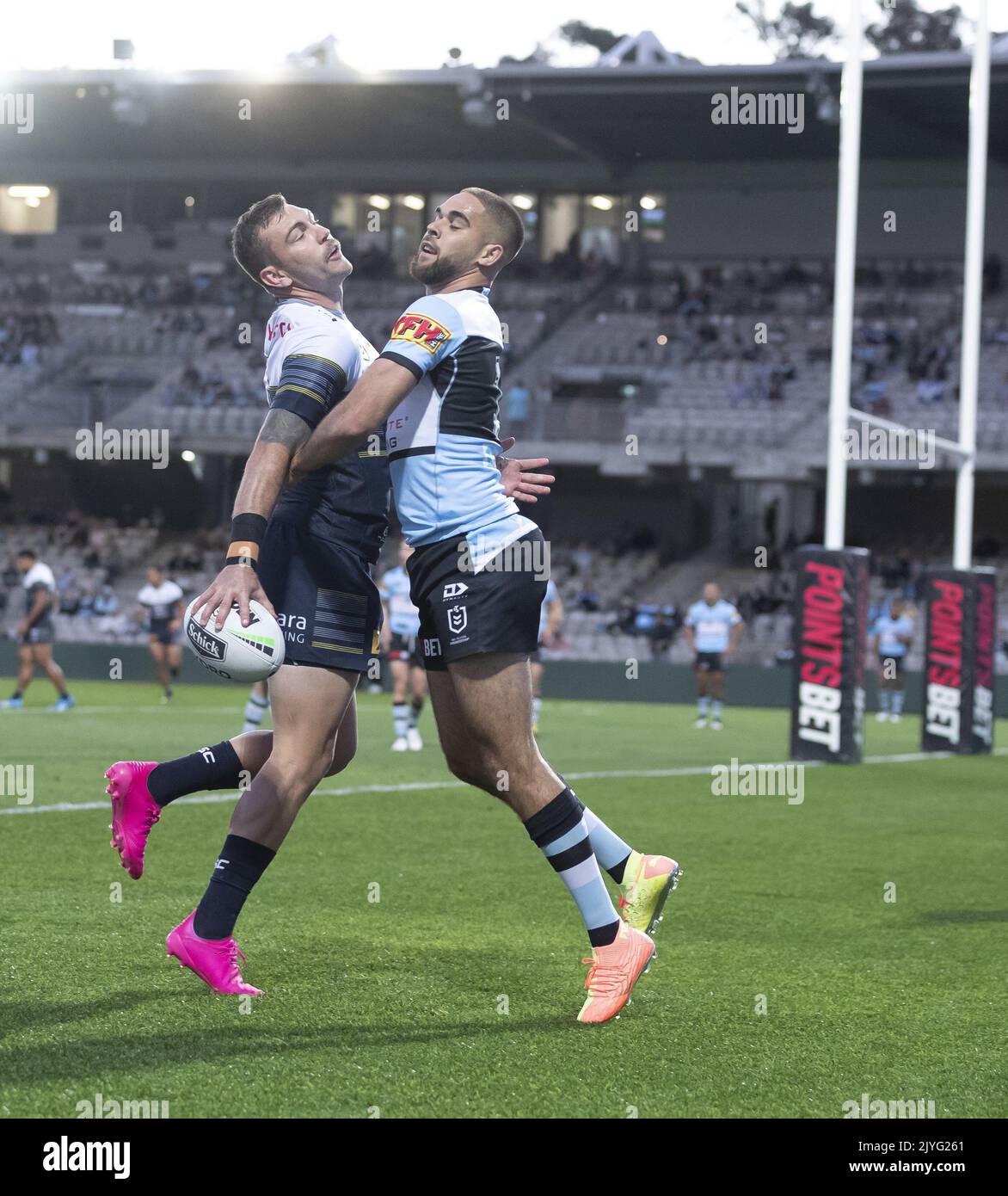 Kyle Feldt of the Cowboys runs into William Kennedy of the Sharks after ...