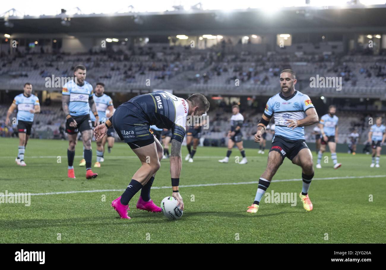 Kyle Feldt of the Cowboys scores during the Round 16 NRL match between ...