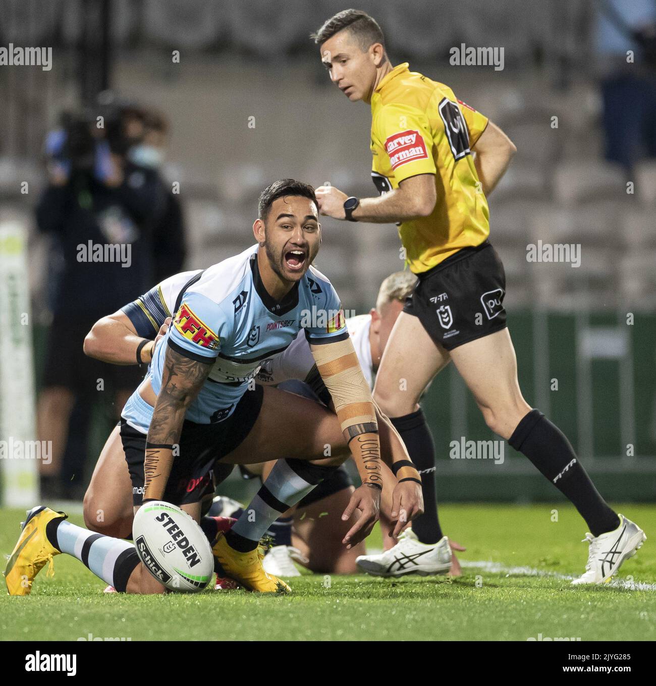 Briton Nikora of the Sharks scores during the Round 16 NRL match ...