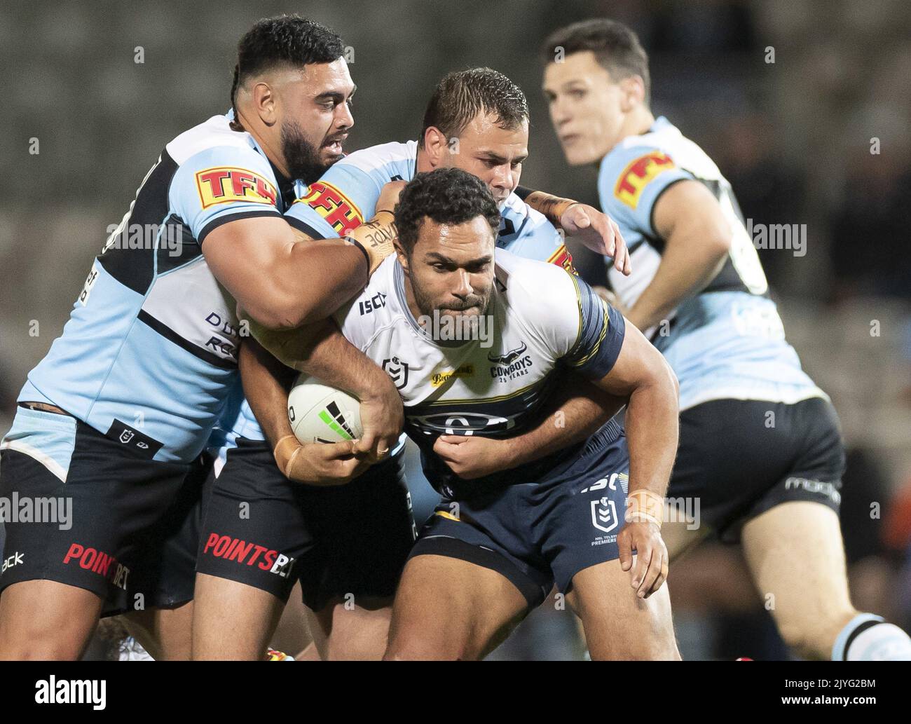 Justin O'Neill of the Cowboys is tackled during the Round 16 NRL match ...