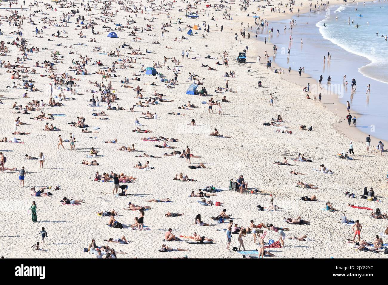 Crowds are seen at Bondi Beach as warm weather returns to the east ...
