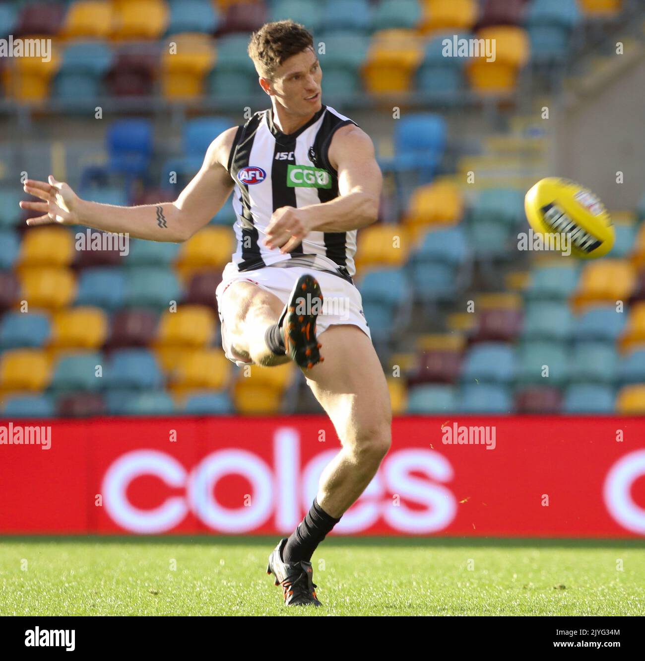 Brody Mihocek of the Magpies kicks a goal during the Round 14 AFL match ...
