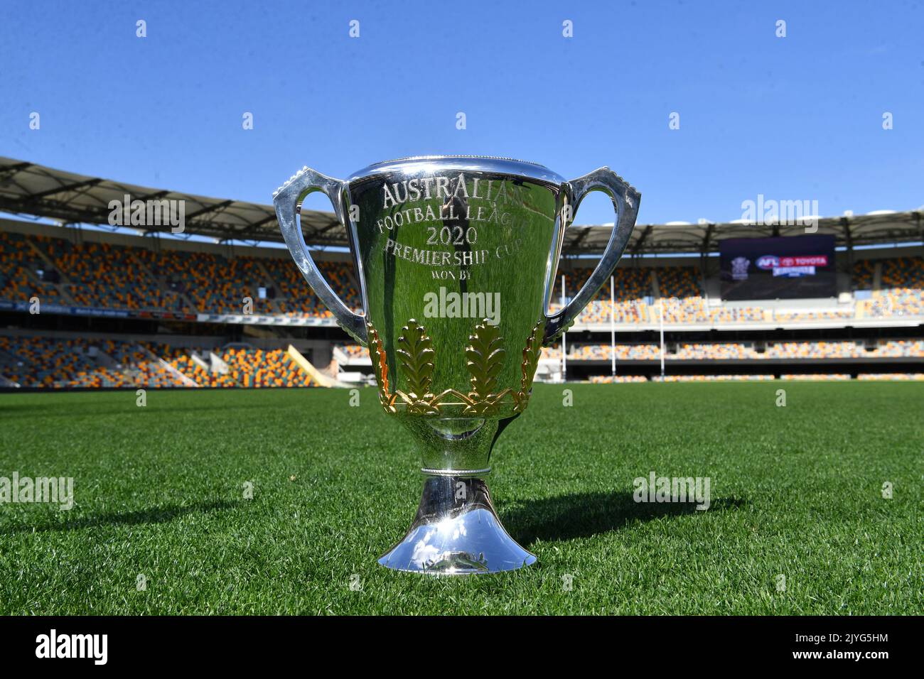The AFL Premiership Cup is seen on the Gabba surface after the ...