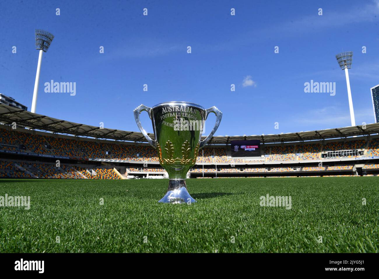 The AFL Premiership Cup is seen on the Gabba surface after the ...