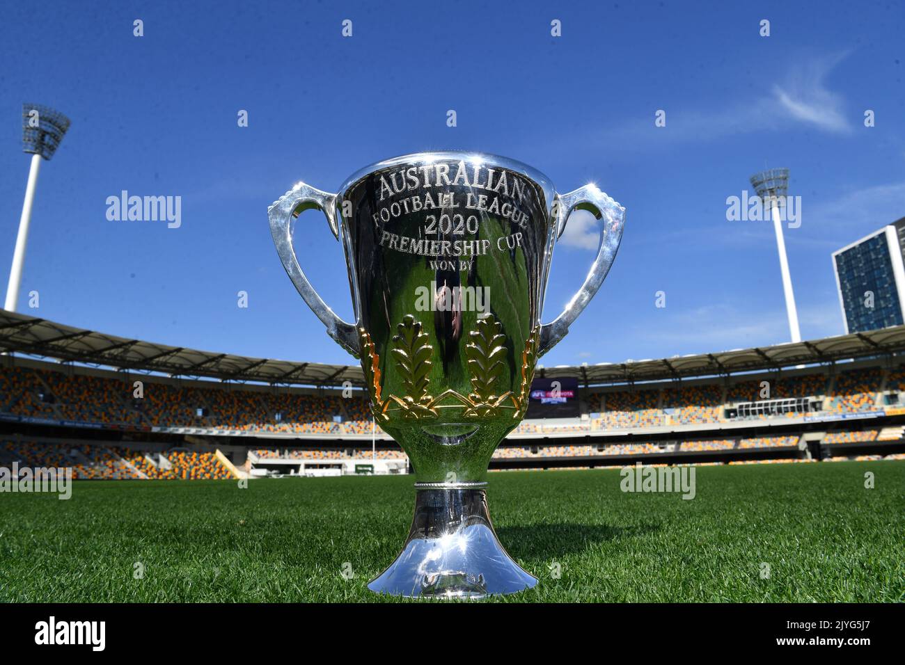 The AFL Premiership Cup is seen on the Gabba surface after the ...