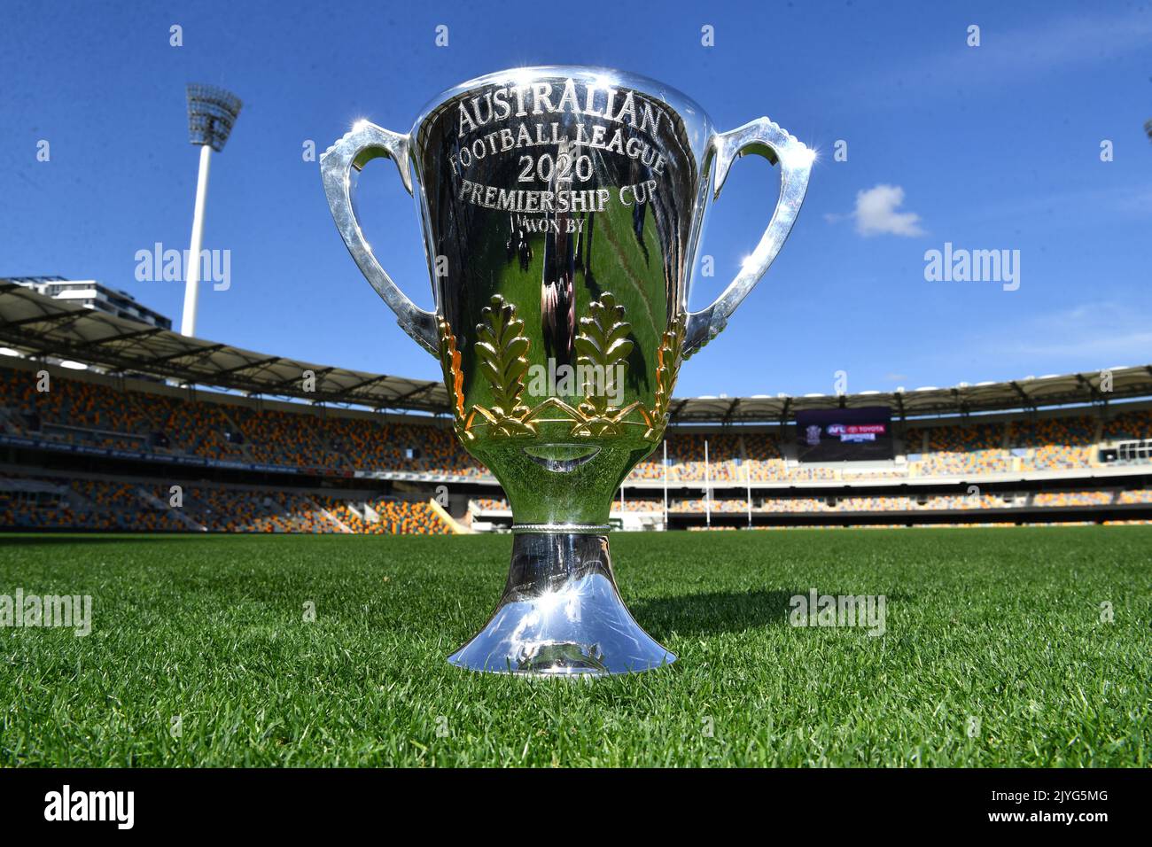 The AFL Premiership Cup is seen on the Gabba surface after the ...
