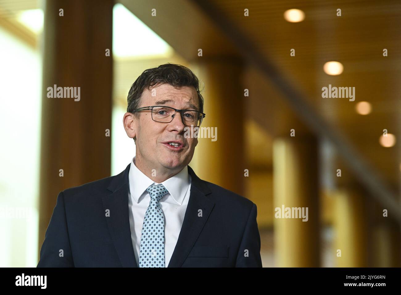 Australian Acting Immigration Minister Alan Tudge speaks to the media ...