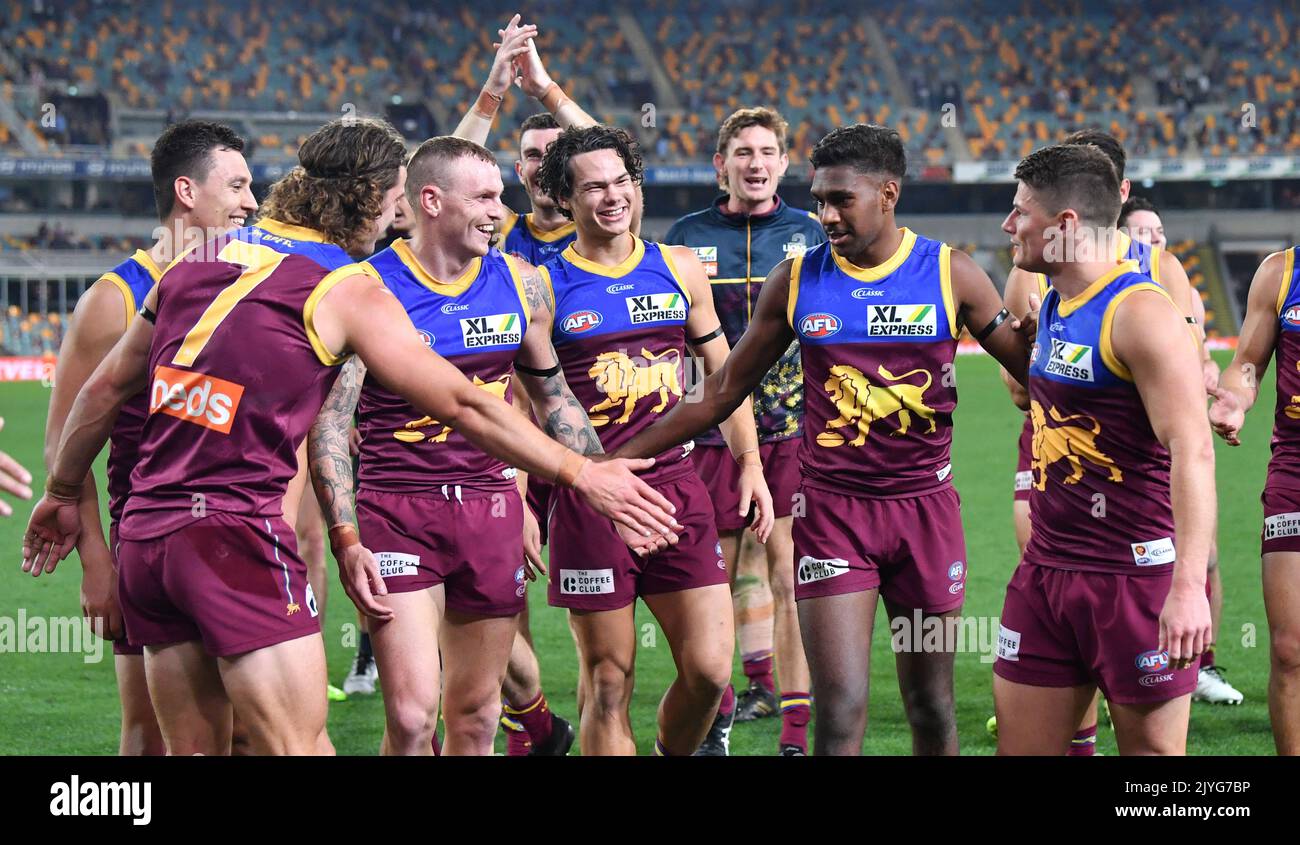 Keidean Coleman (centre) of the Lions celebrates winning with team ...