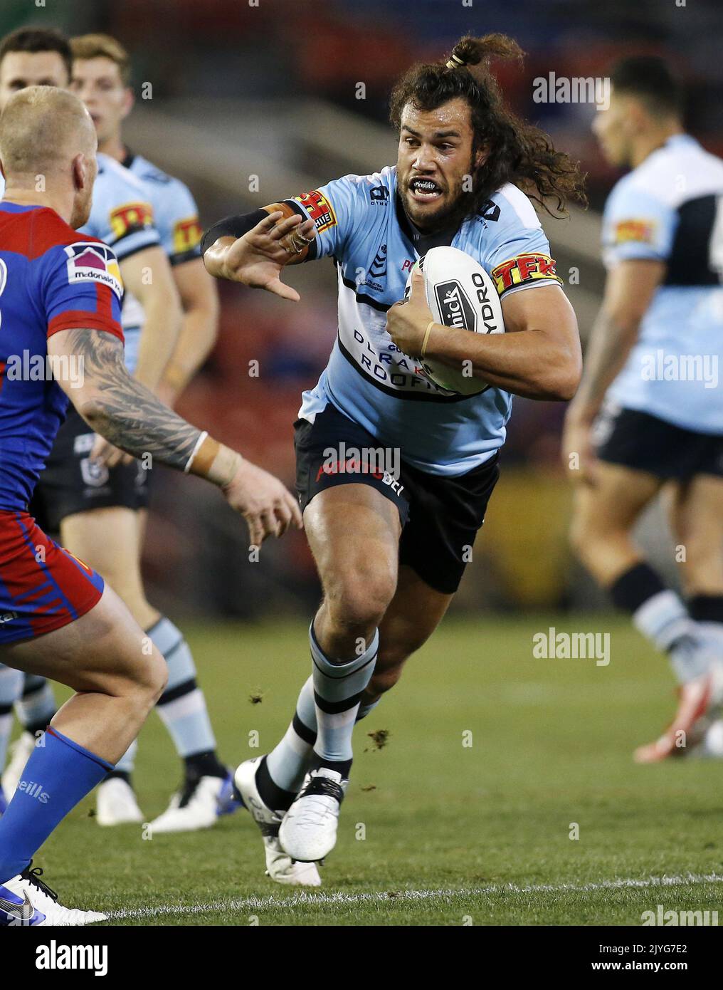 Toby Rudolf of the Sharks makes a hit up during the Round 17 NRL match ...