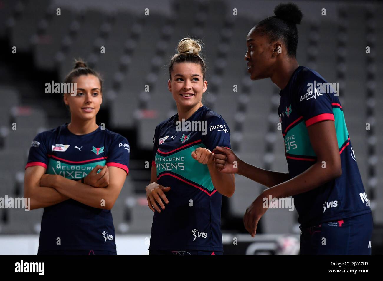 Allie Smith bumps fists with Kadie-Ann Dehaney of the Vixens during the ...