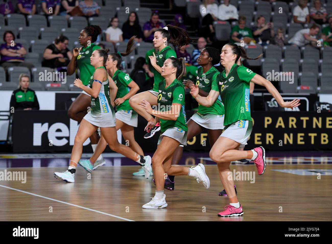 West Coast Fever players warm up during the Round 10 Super Netball ...