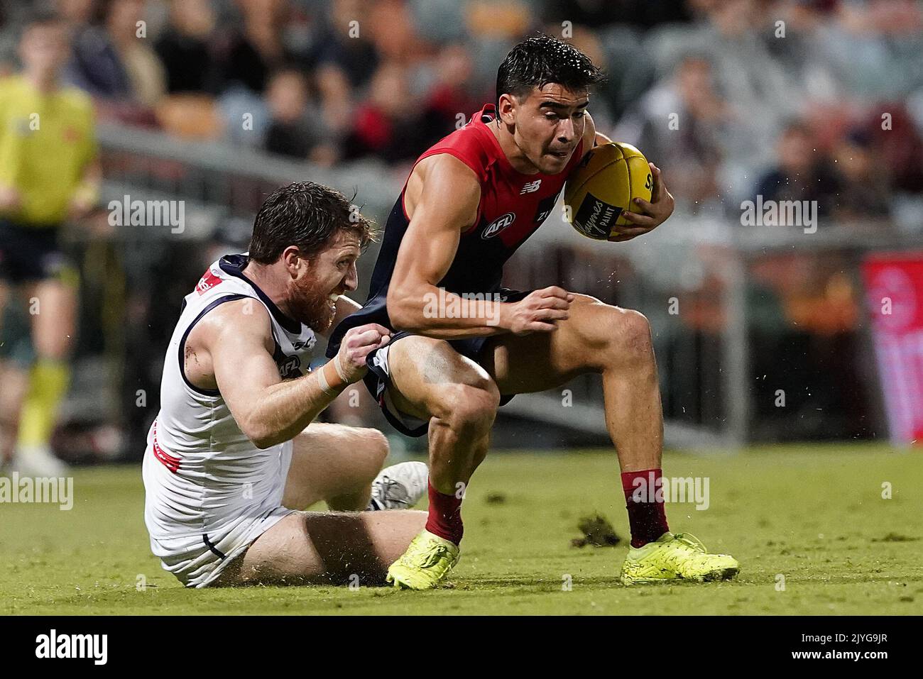 Reece Conca of the Dockers tackles Toby Bedford of the Demons during ...