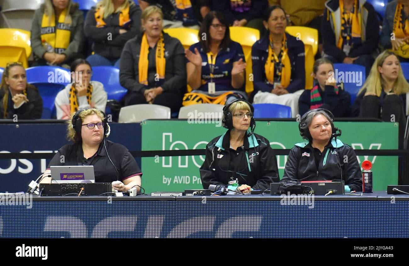 Officials are seen on the bench during the Round 11 Super Netball match ...