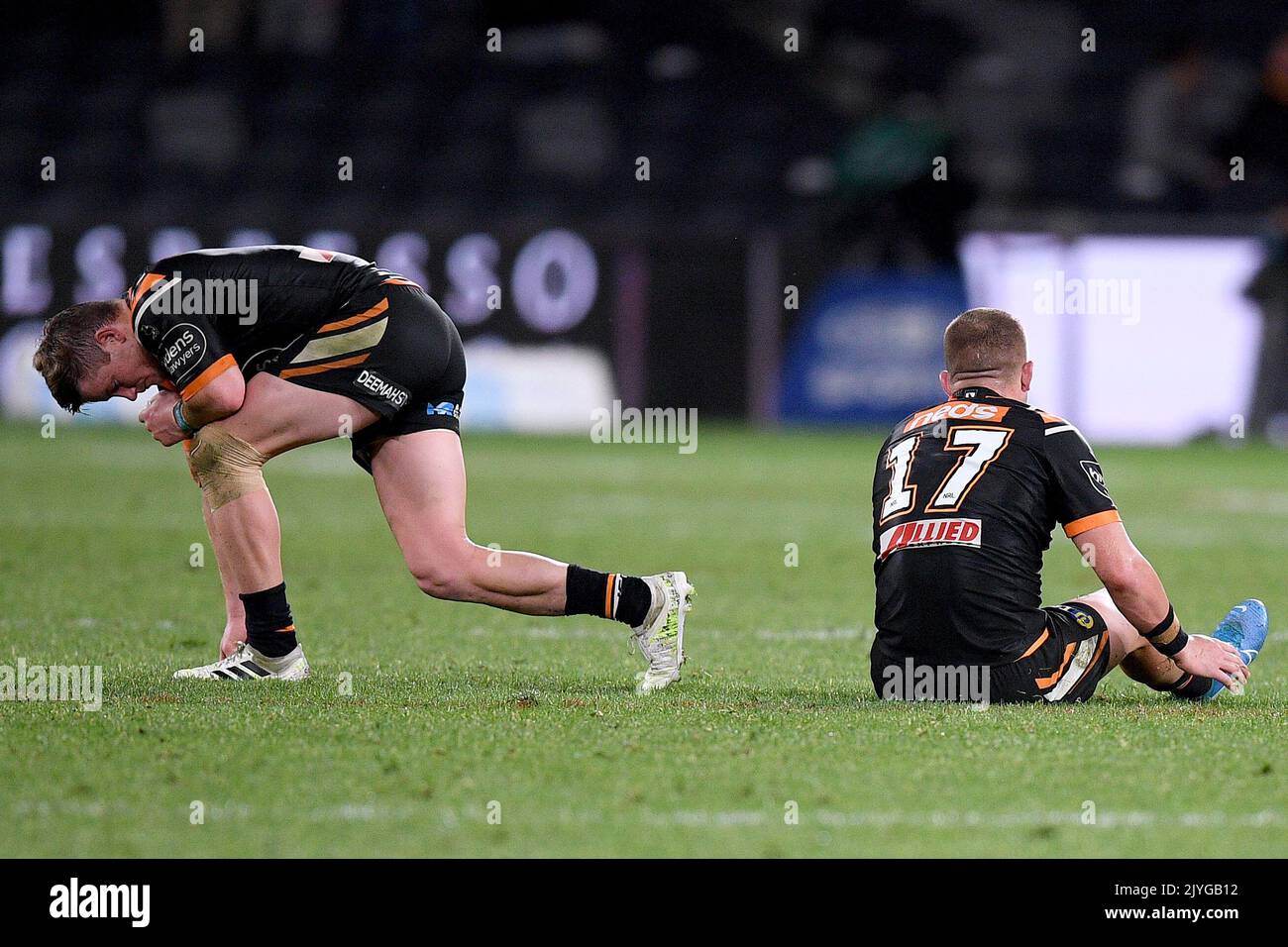 Harry Grant (left) and Sam McIntyre of the Tigers react following the ...