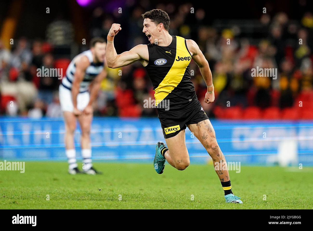 Jason Castagna of the Tigers reacts after kicking a goal during the ...