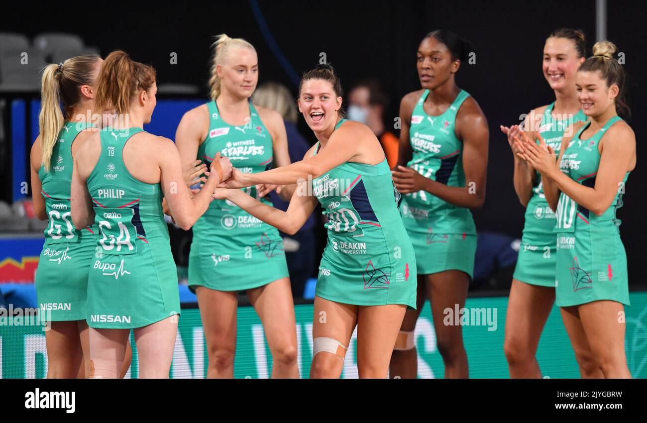 Kate Eddy (centre) of the Vixens is seen with team mates during the ...