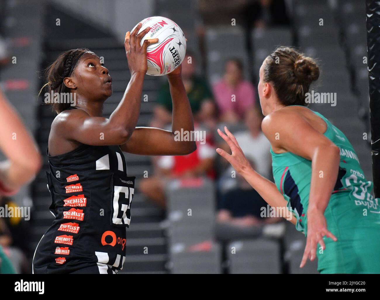 Shimona Nelson (left) of the Magpies shoots for goal during the Round ...