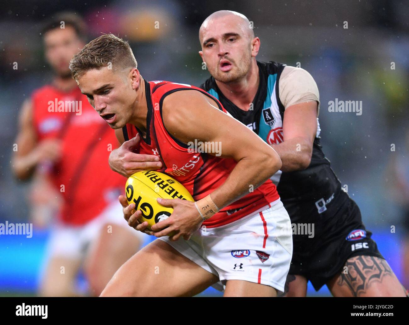 Sam Powell- Pepper of the Power and Matt Guelfi of the Bombers during ...