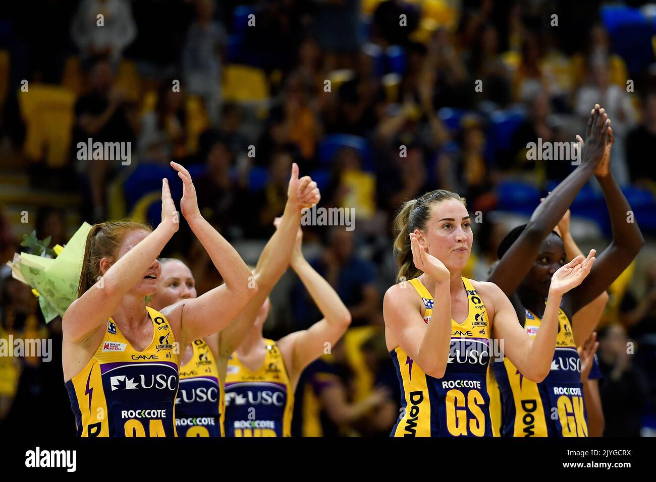 Sunshine Coast Lightning players salute fans after their victory during ...