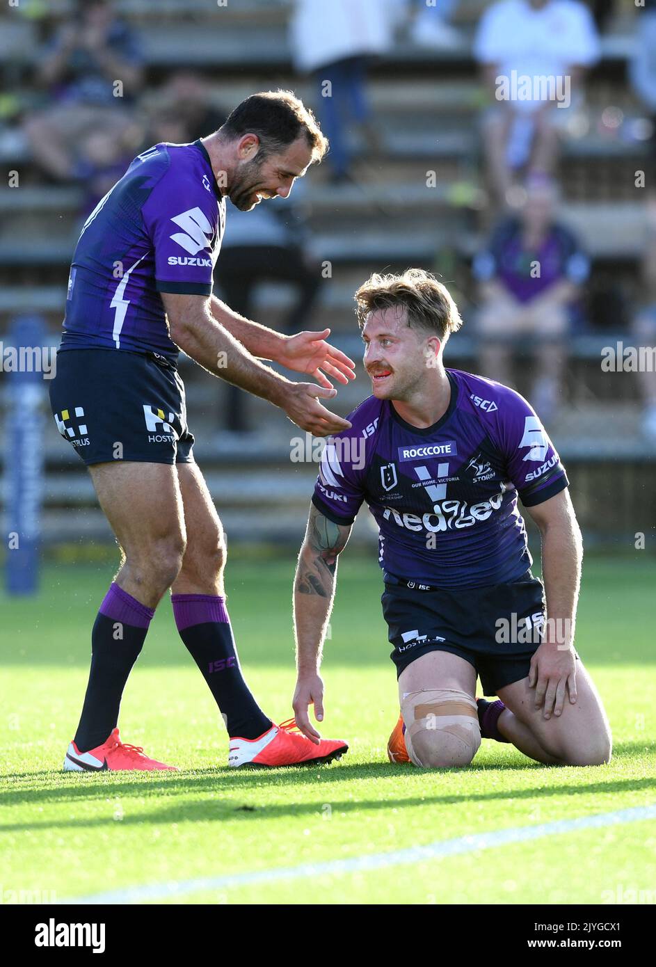 Storm captain Cameron Smith (left) congratulates Cameron Munster after ...