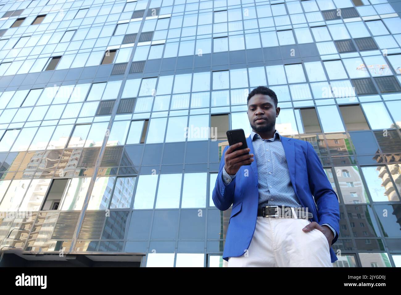 Mature businessman enjoys working ceo against office building Stock ...