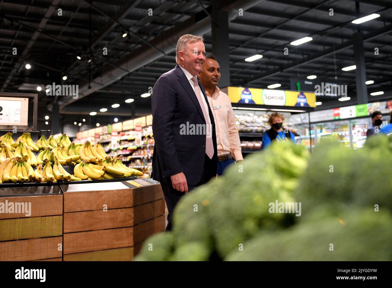 Federal opposition leader Anthony Albanese speaks with employees at ...