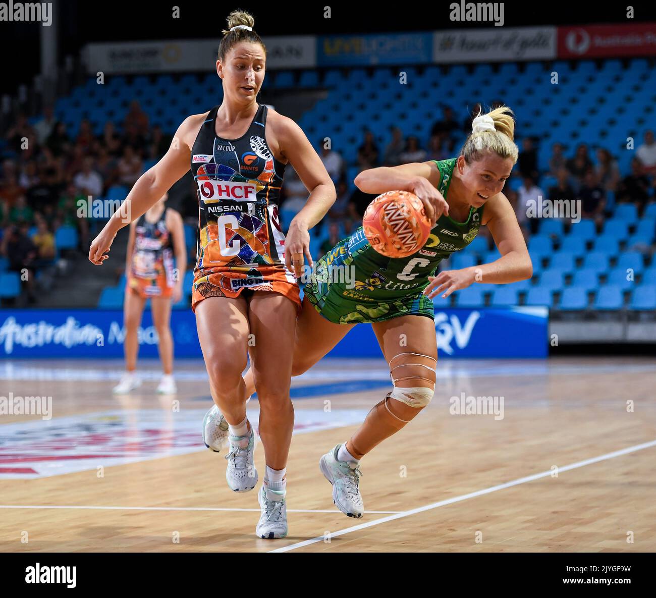 Jamie-Lee Price of the Giants and Jess Anstiss of the Fever compete for ...