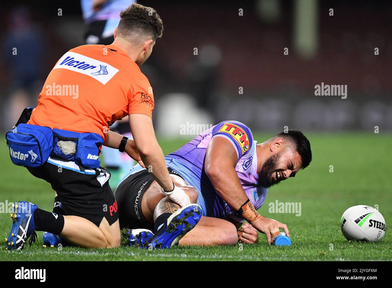 An injured Royce Hunt of the Sharks during the Round 19 NRL match ...