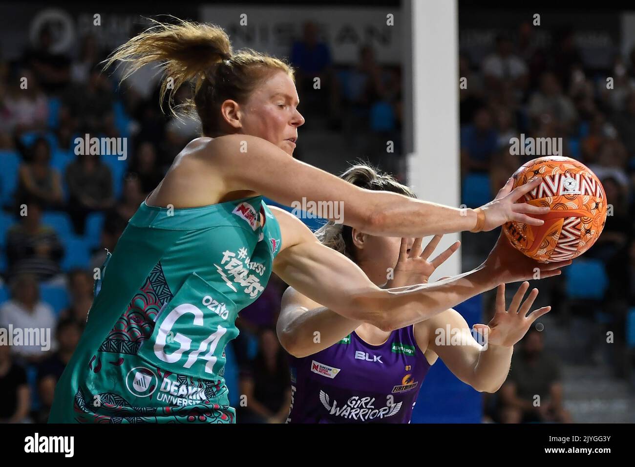 Tegan Philip of the Vixens and Kim Jenner of the Firebirds compete for ...