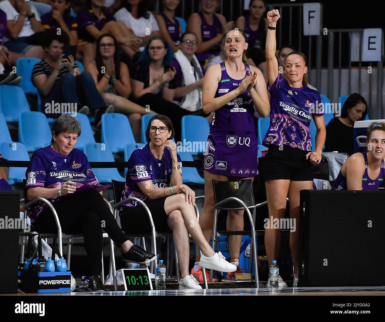Queensland Firebirds coaching staff and players celebrate during the ...