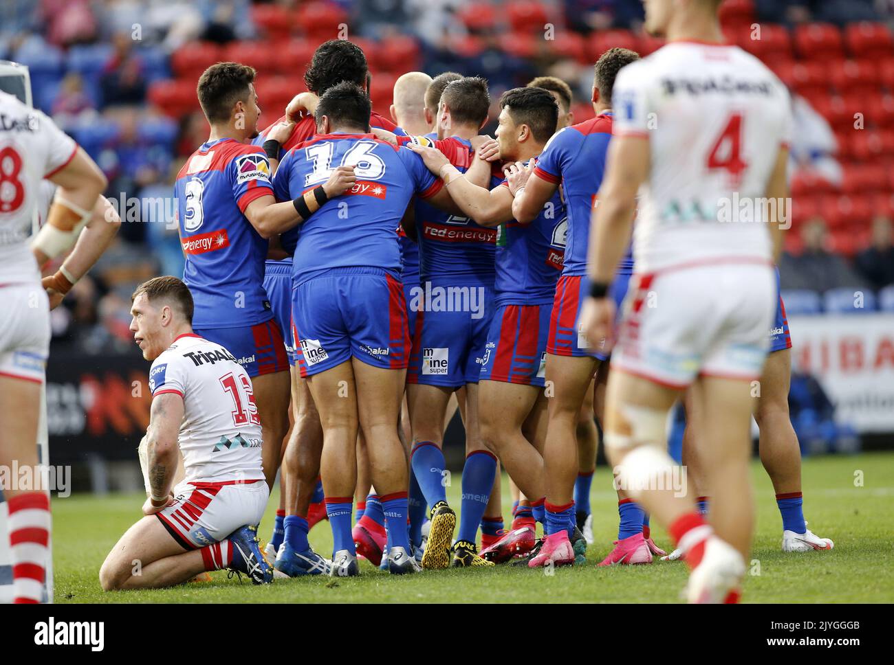 Knights players celebrate a Jacob Saifiti try during the Round 19 NRL ...