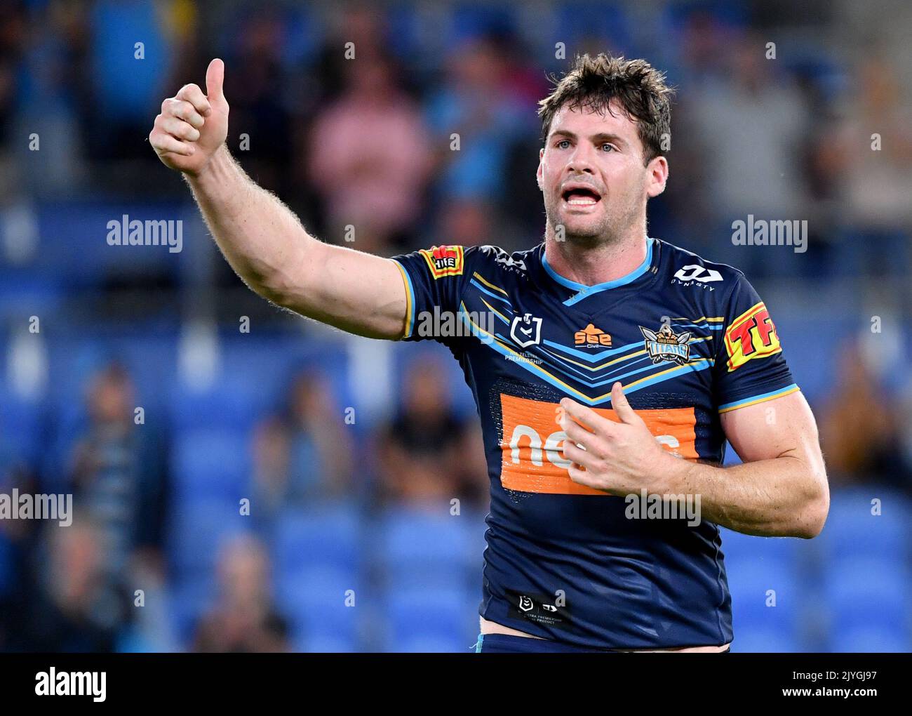 Anthony Don of the Titans celebrates winning the Round 20 NRL match ...