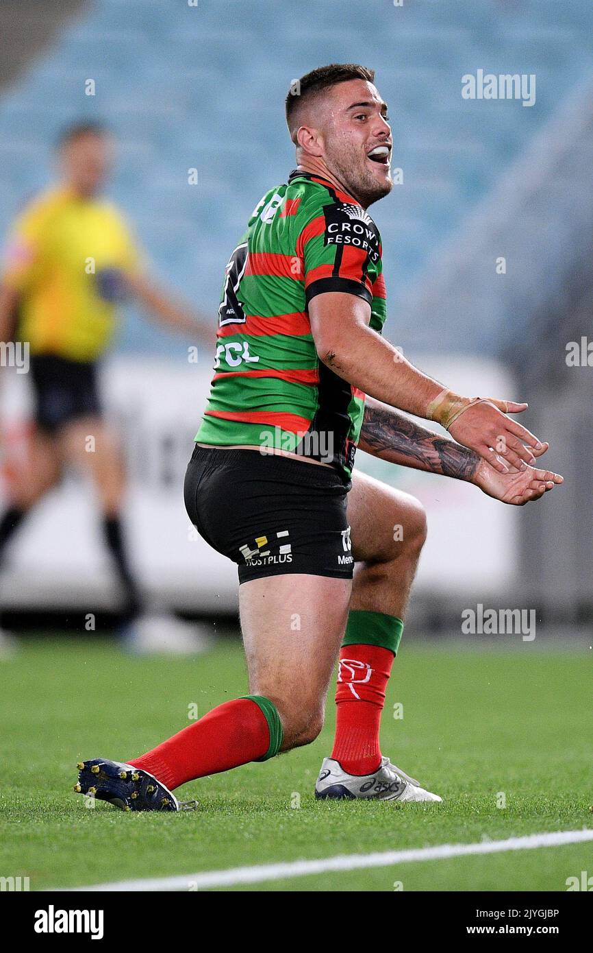 Corey Allan of the Rabbitohs celebrates after scoring a try during the ...