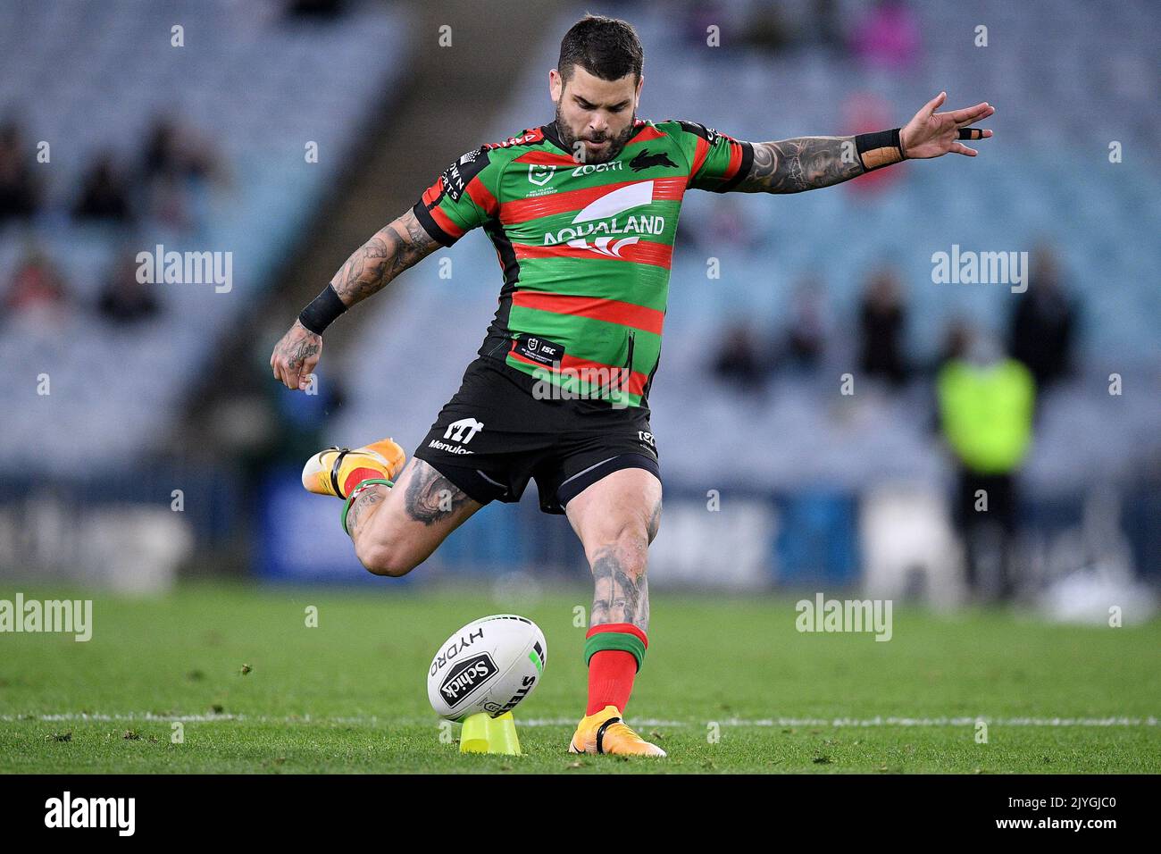 Adam Reynolds of the Rabbitohs kicks a penalty goal on full time during ...