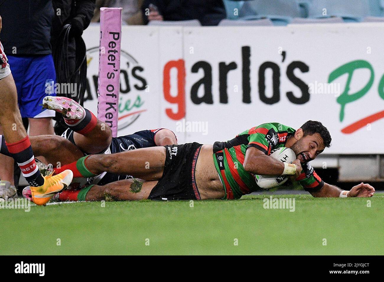 Alex Johnston of the Rabbitohs scores a try during the Round 20 NRL ...