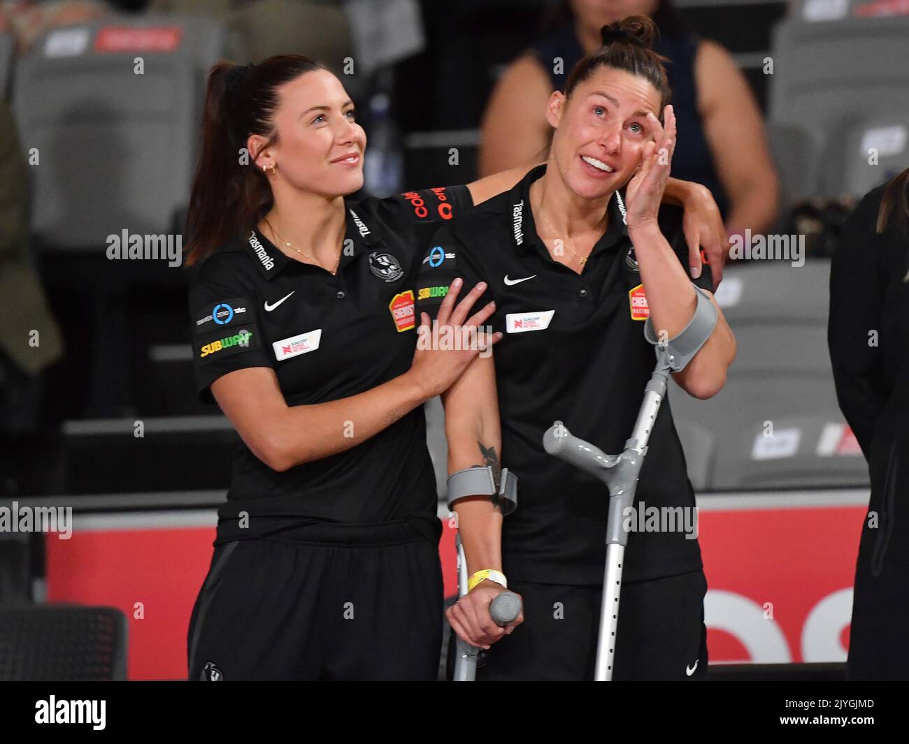 Madi Browne (right) of the Magpies is seen with her sister Kelsey ...
