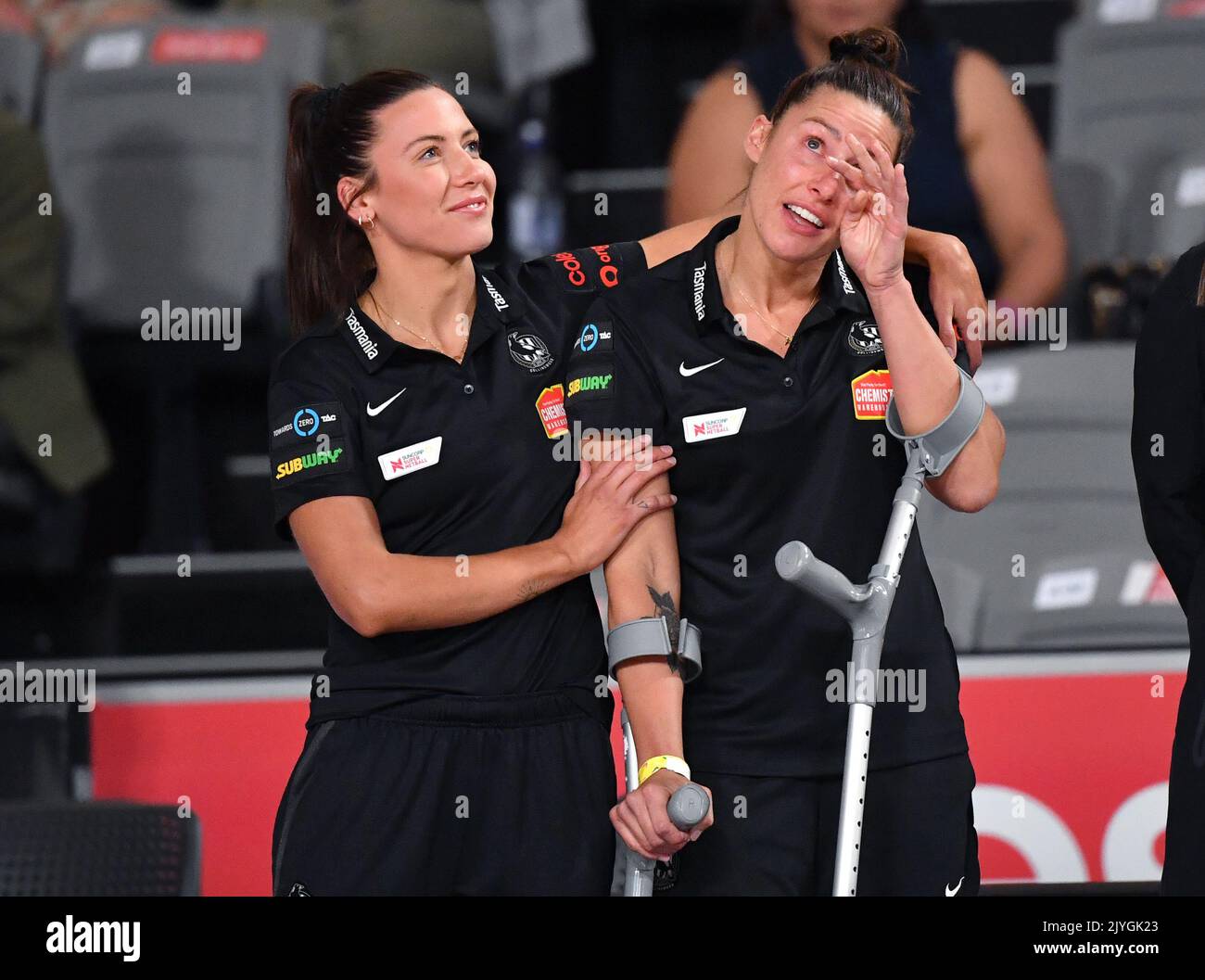 Madi Browne (right) of the Magpies is seen with her sister Kelsey ...